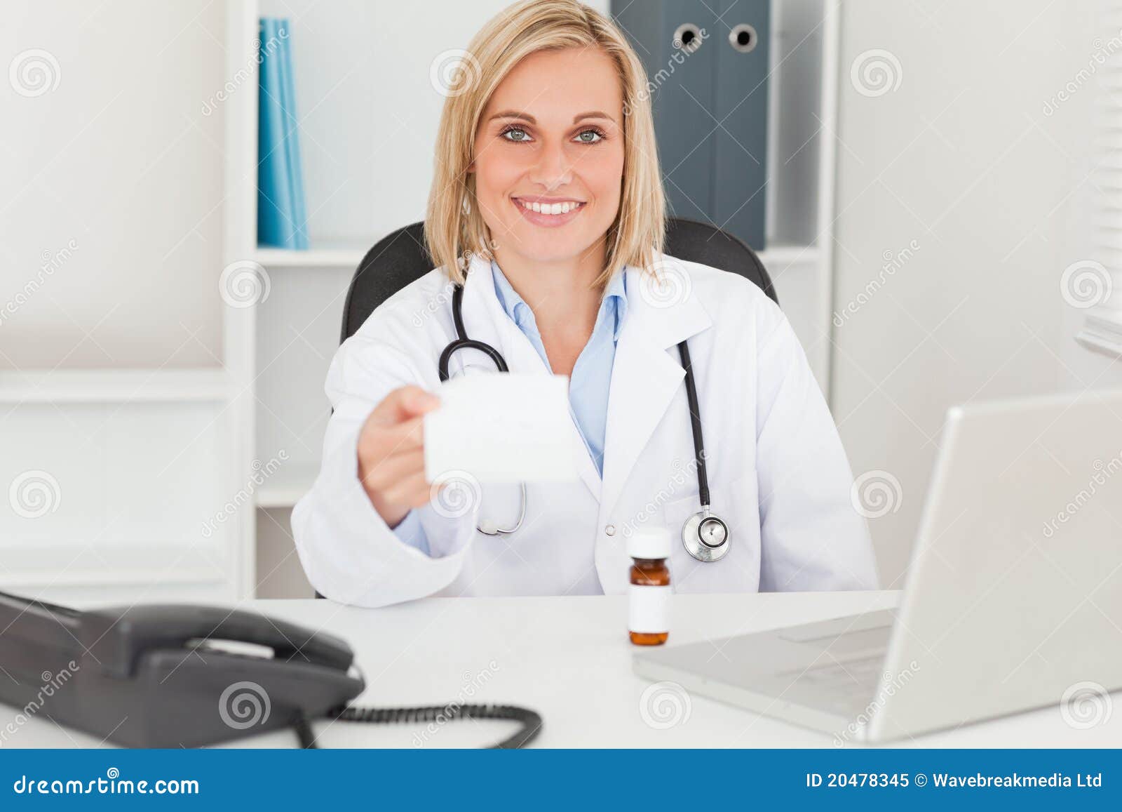 Doctor Holding Prescription Stock Image - Image of female, happy: 20478345
