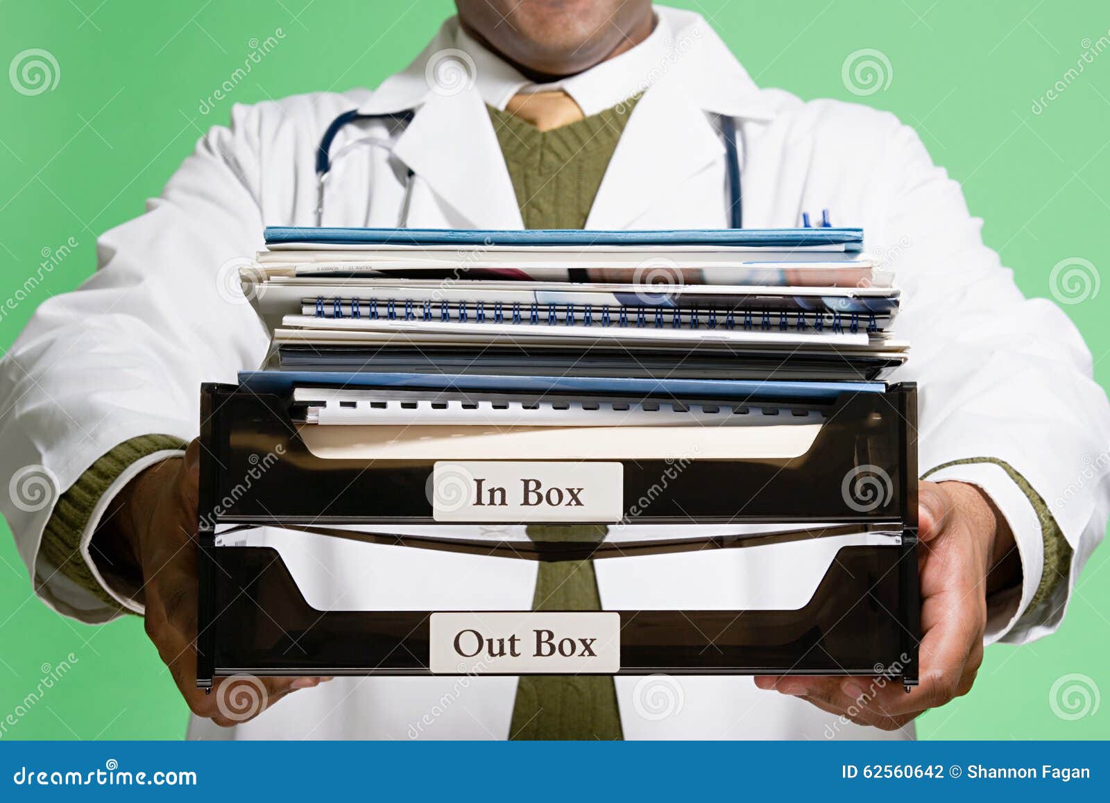 Doctor Holding a Stack of Paperwork Stock Photo - Image of background ...