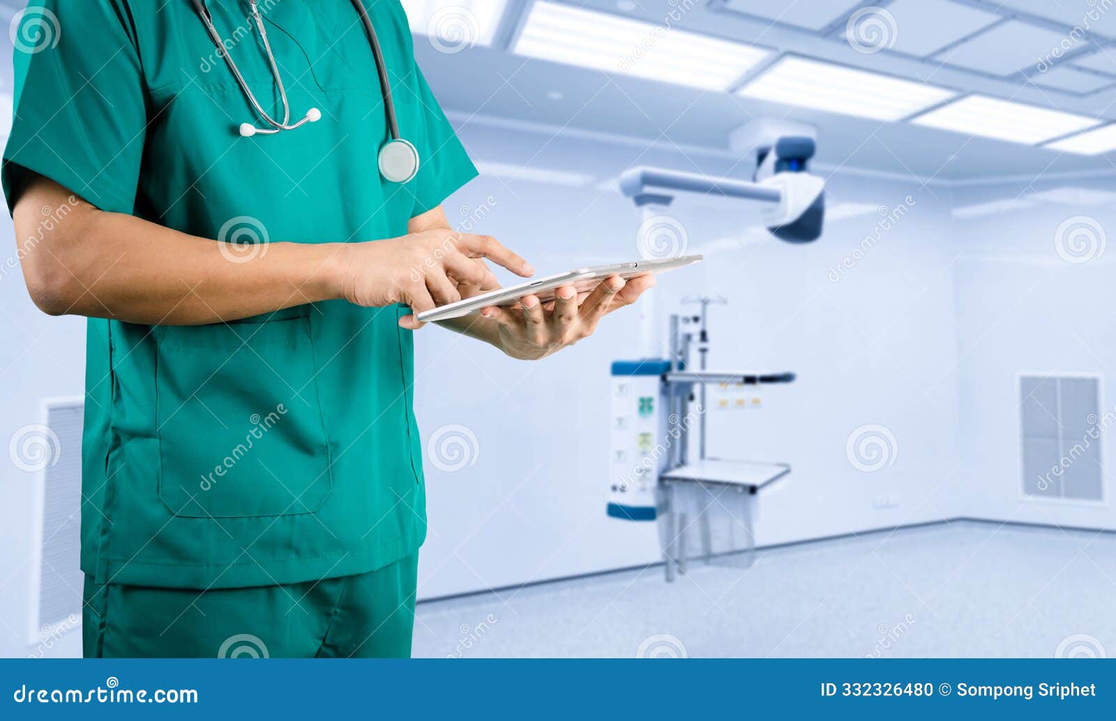 Doctor Holding Tablet in Operating Room in Hospital Stock Photo - Image ...
