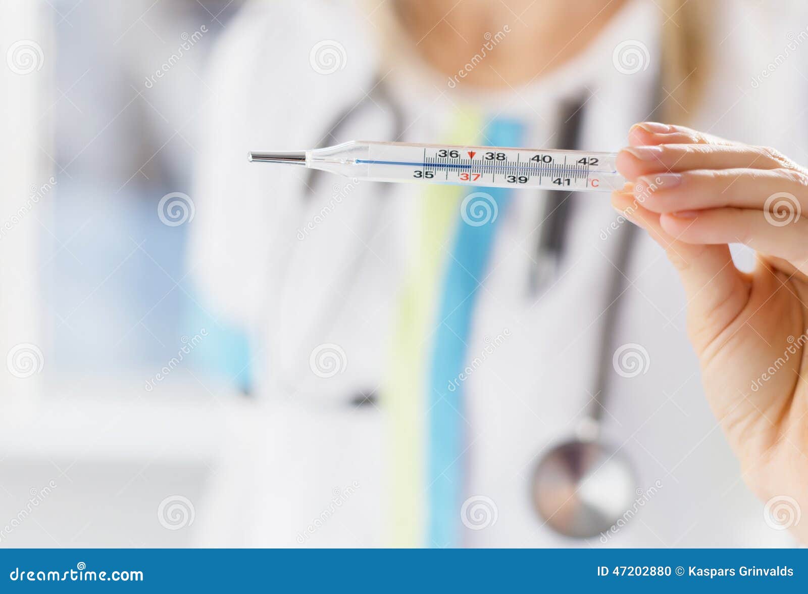 Doctor holding thermometer stock photo. Image of packaging - 47202880