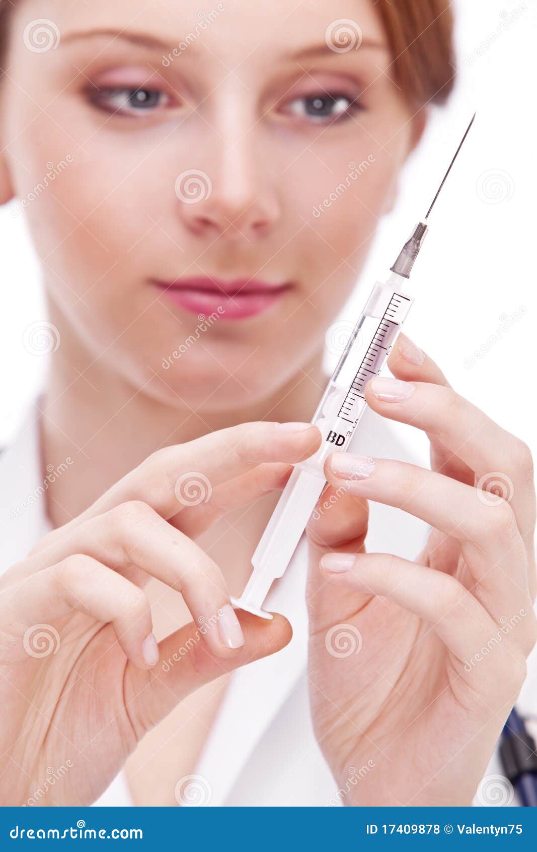Doctor holds on syringe. stock photo. Image of white - 17409878