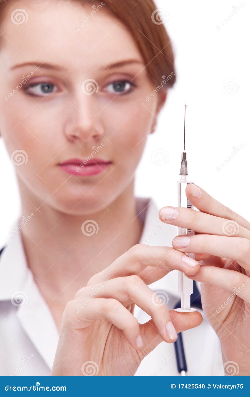 Doctor holds on syringe. stock photo. Image of white - 17425540