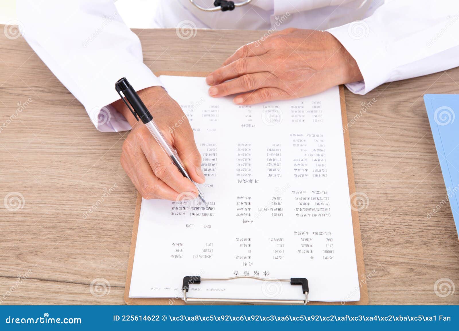 The Doctor in the Hospital is Checking the Patientâ€™s Test Report ...