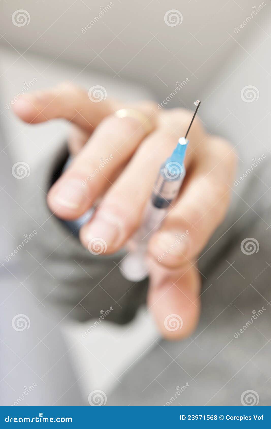 Doctor with an Injection stock photo. Image of cure, adult - 23971568