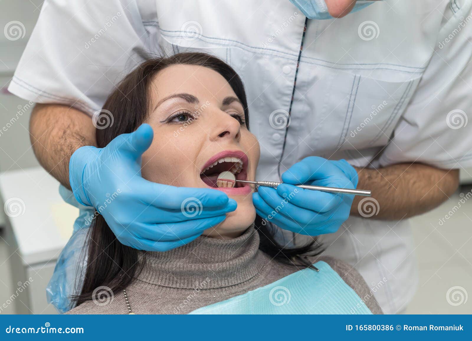 Doctor Inspecting Patient`s Teeth with Mirror Close Up Stock Photo ...