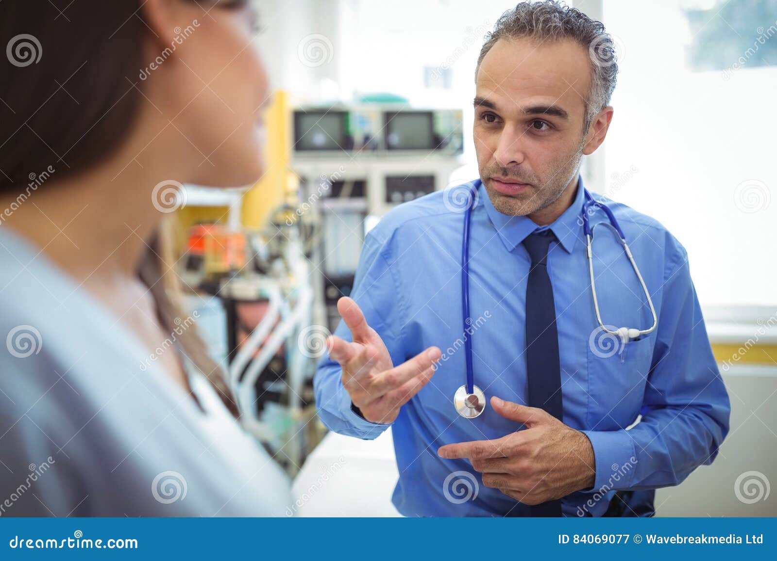 Doctor Interacting with Patient Stock Image - Image of assisting ...