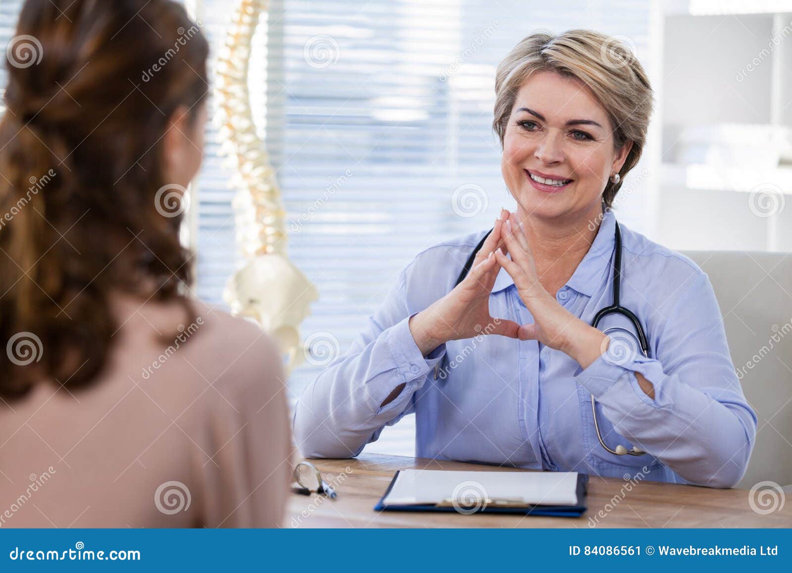 Doctor Interacting with Patient Stock Image - Image of female, health ...