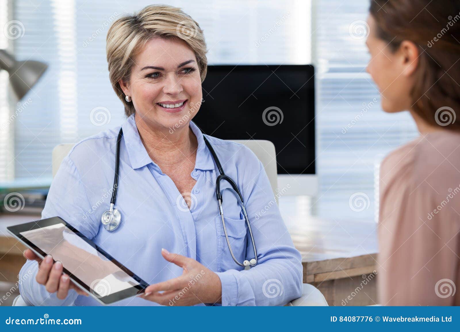 Doctor Interacting with Patient Stock Photo - Image of beautiful ...