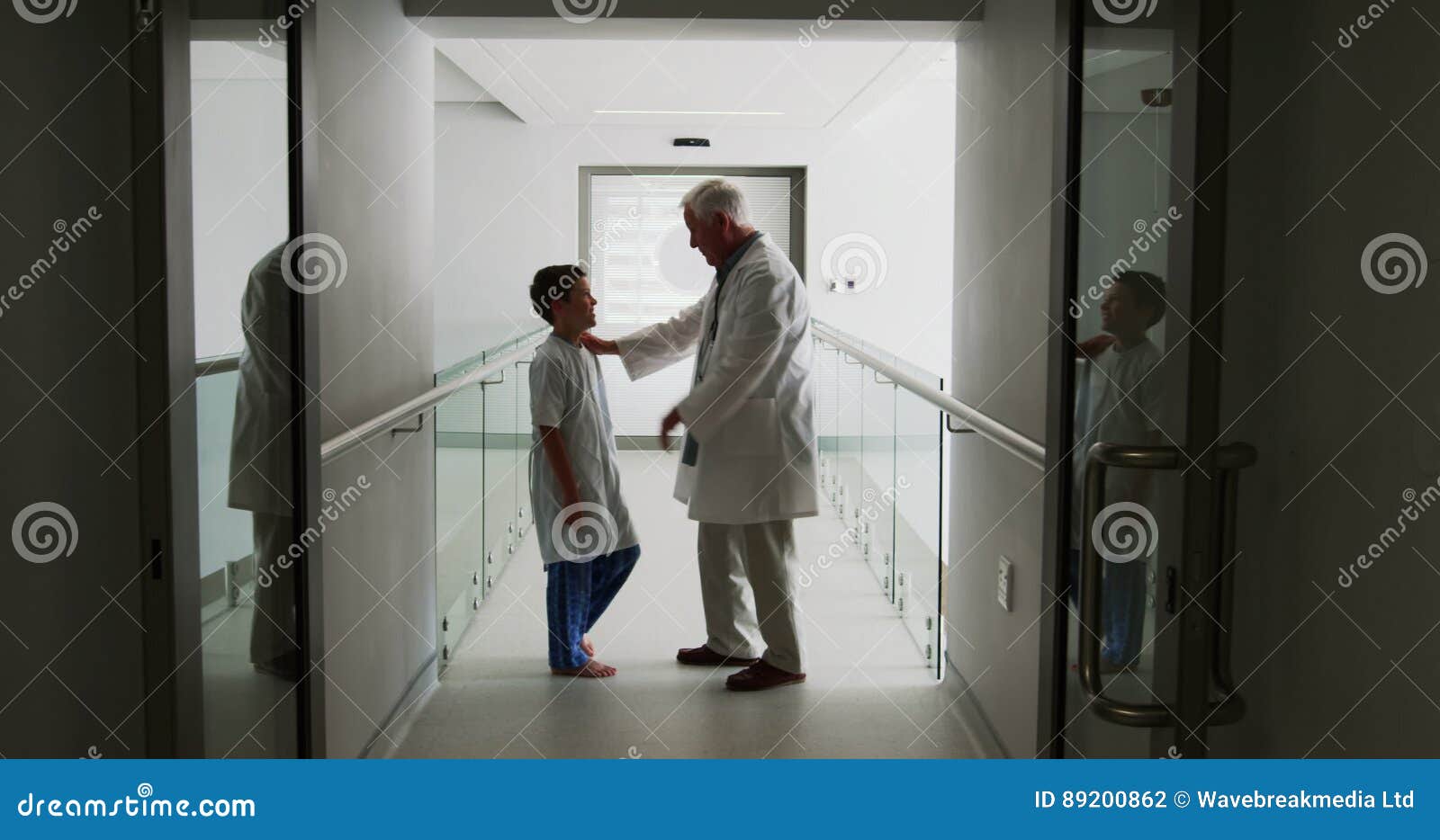 Doctor Interacting with Patient in Corridor Stock Footage - Video of ...