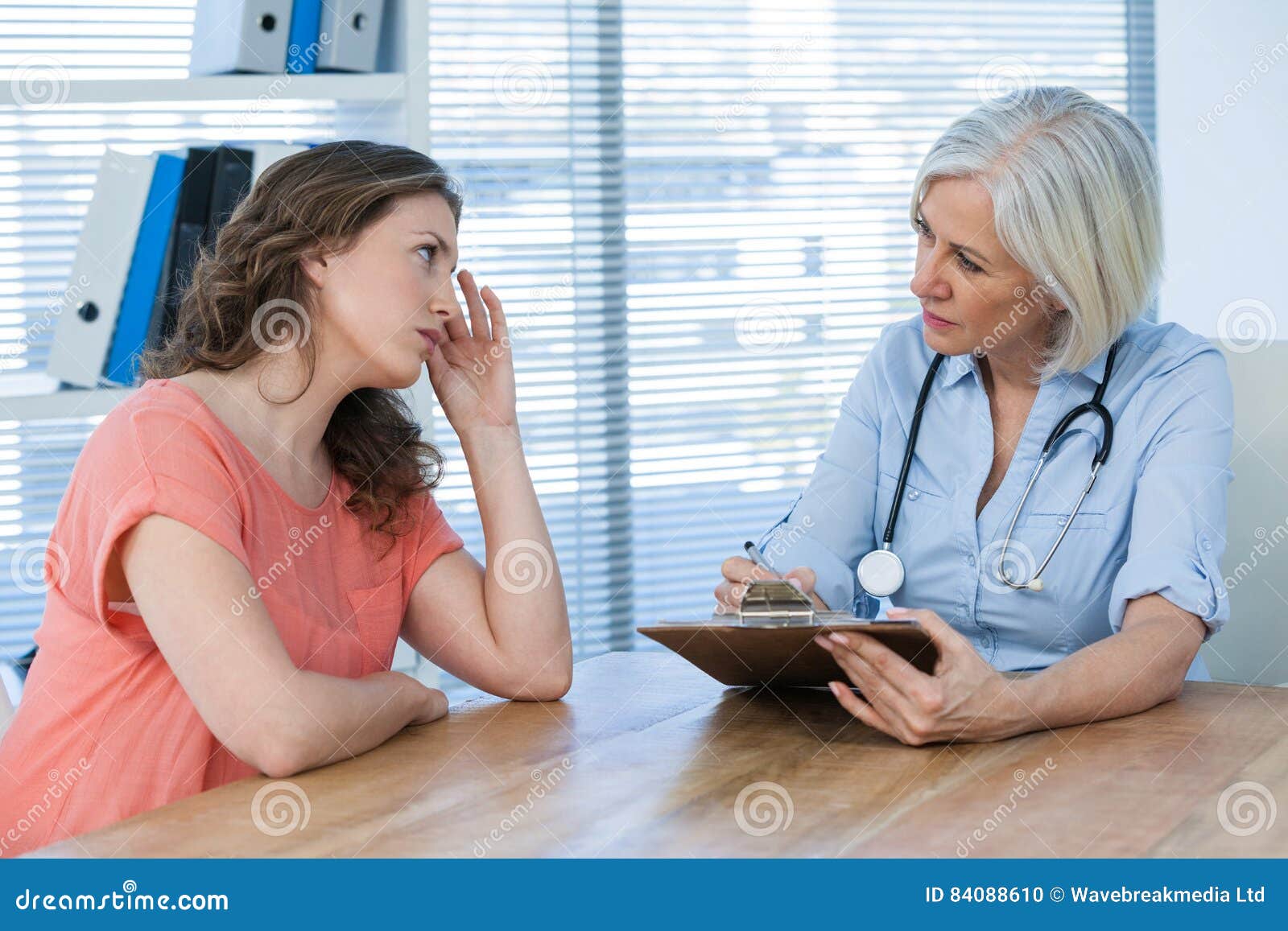 Doctor Interacting with Patient Stock Photo - Image of practitioner ...