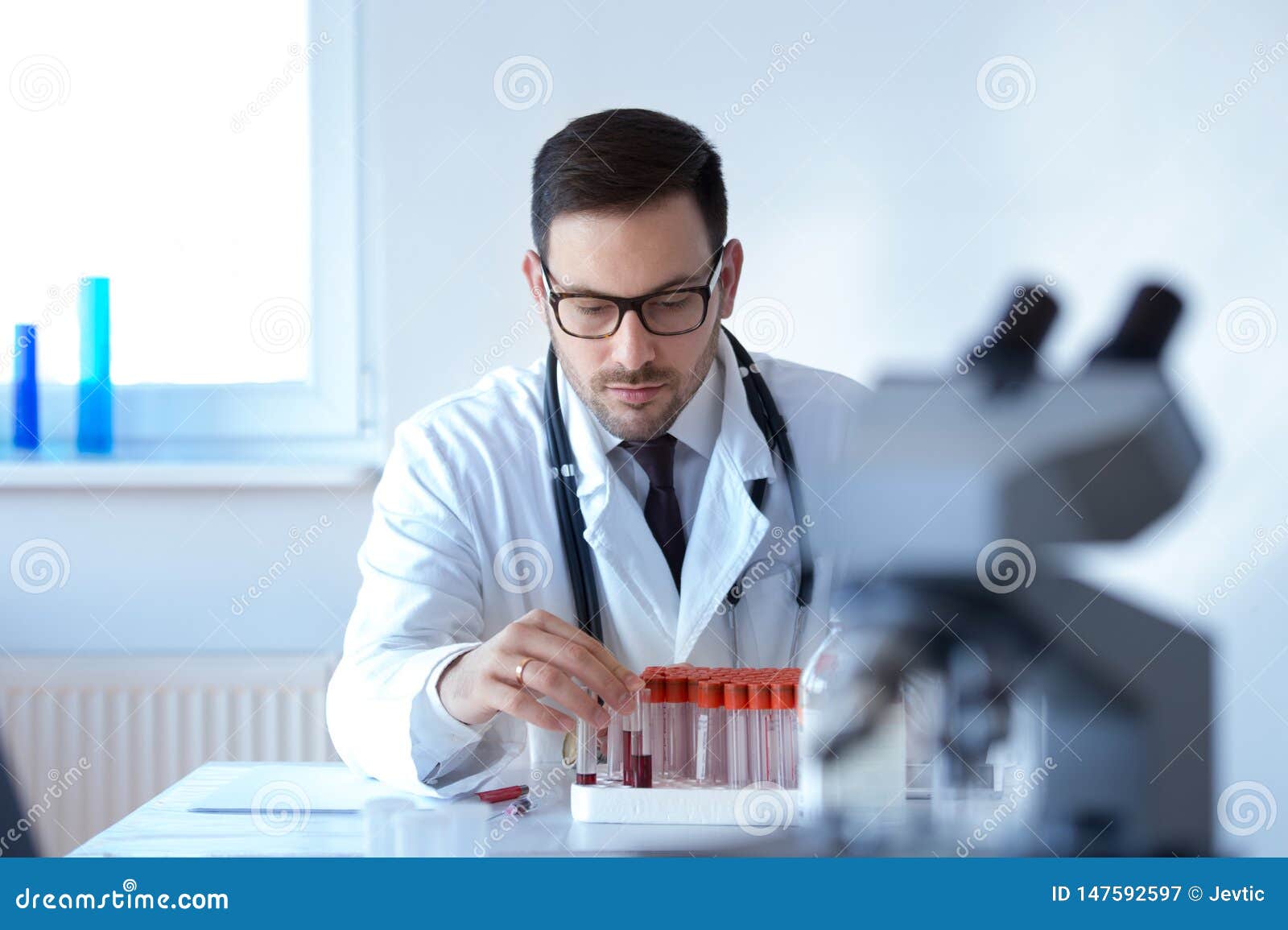 Doctor in laboratory stock image. Image of biotechnology - 147592597