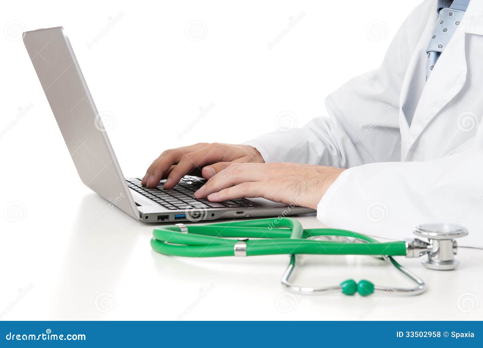 Doctor with laptop stock photo. Image of hand, desk, white - 33502958