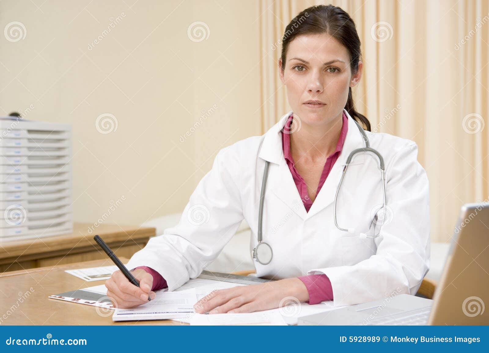 Doctor with Laptop Writing in Doctor S Office Stock Image - Image of ...