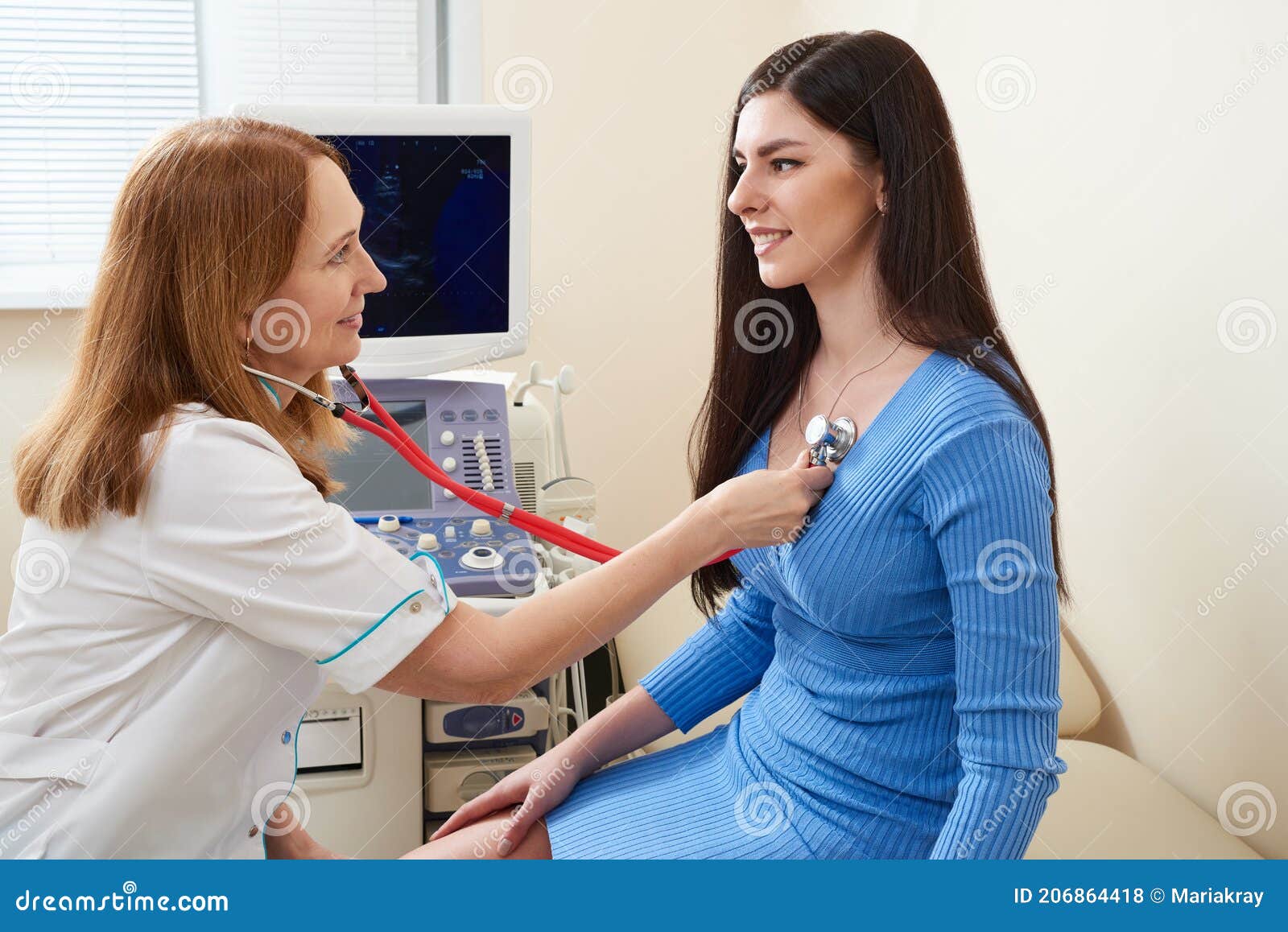 Doctor Listening Stethoscope With To Heart Of Young Female Patient