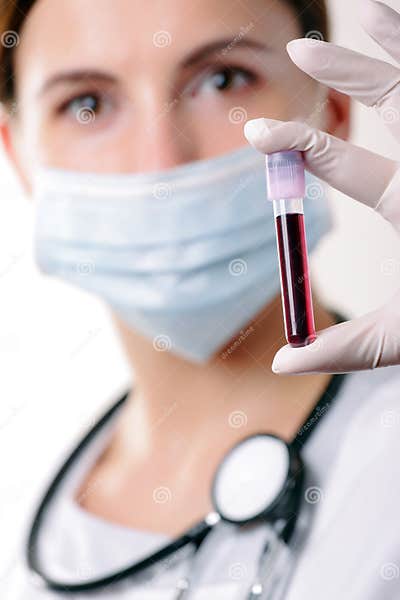 Doctor Looking at a Blood Sample Stock Photo - Image of clinical, eyes ...