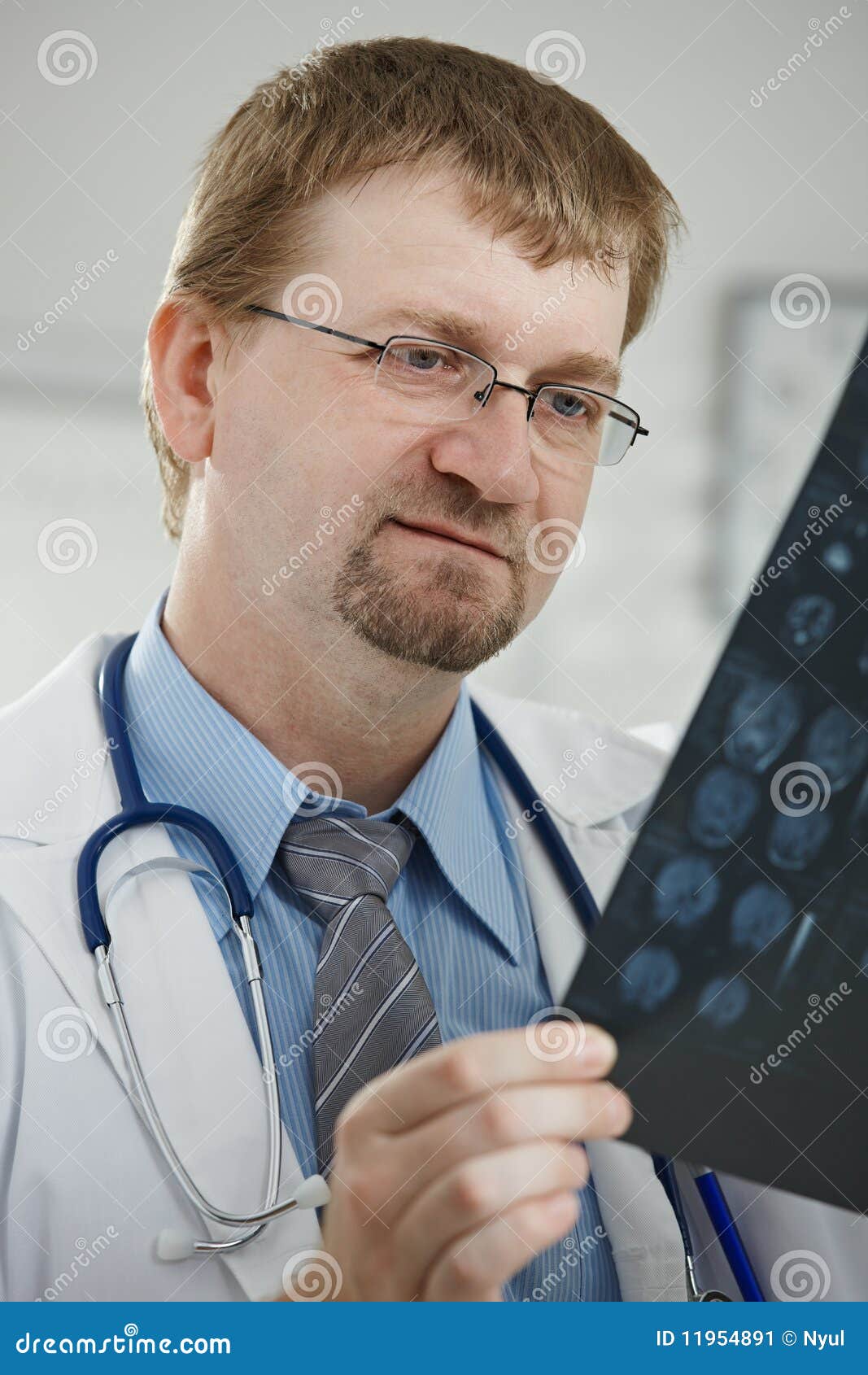 Doctor Looking at Medical Scan Stock Image - Image of doctor, checkup ...