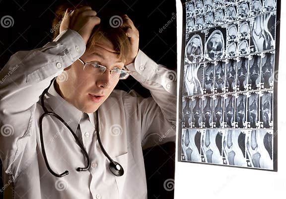Doctor Looking at the MRI Scan with Panic Stock Photo - Image of expert ...