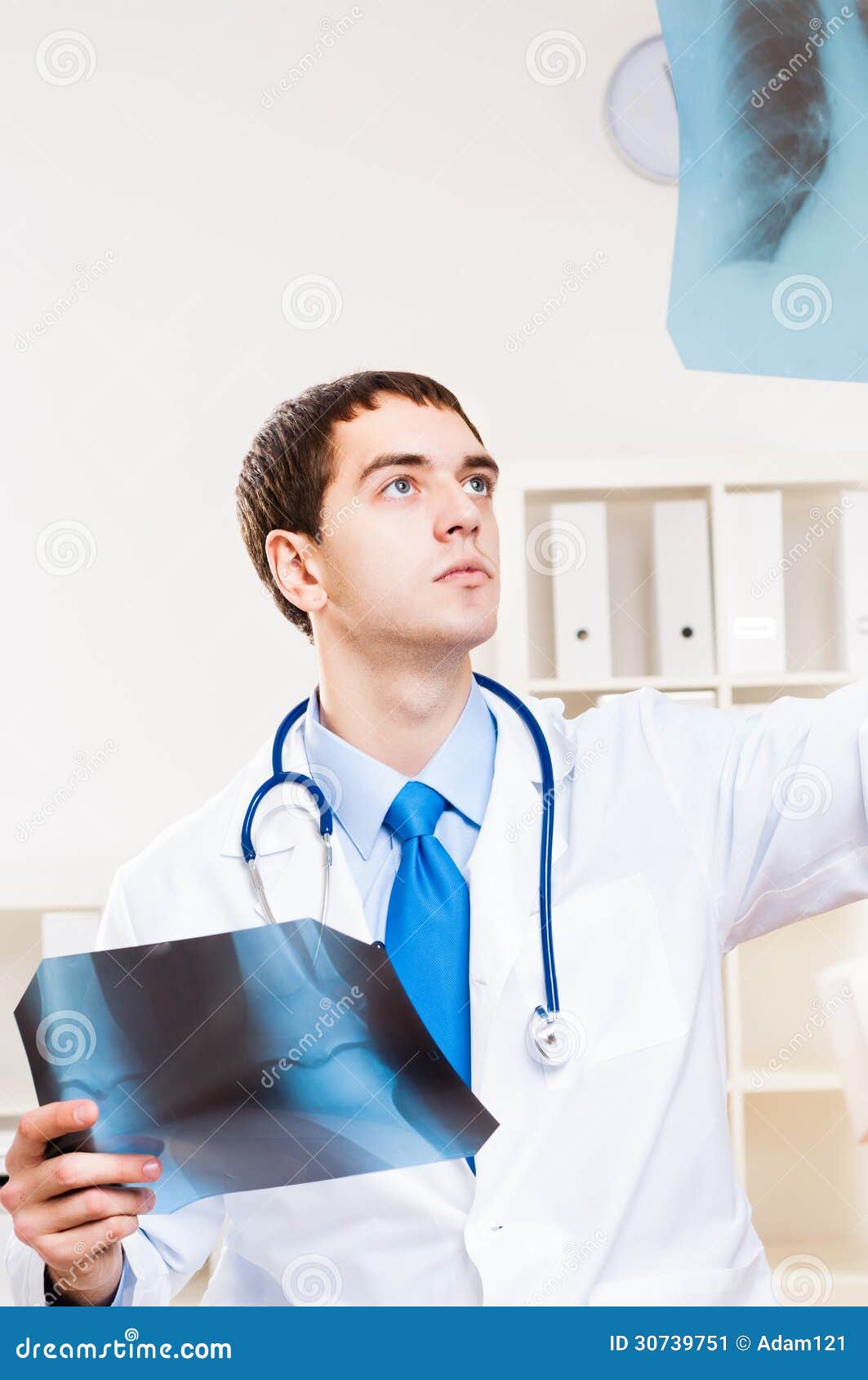 Doctor looking the x-ray stock image. Image of film, analysis - 30739751