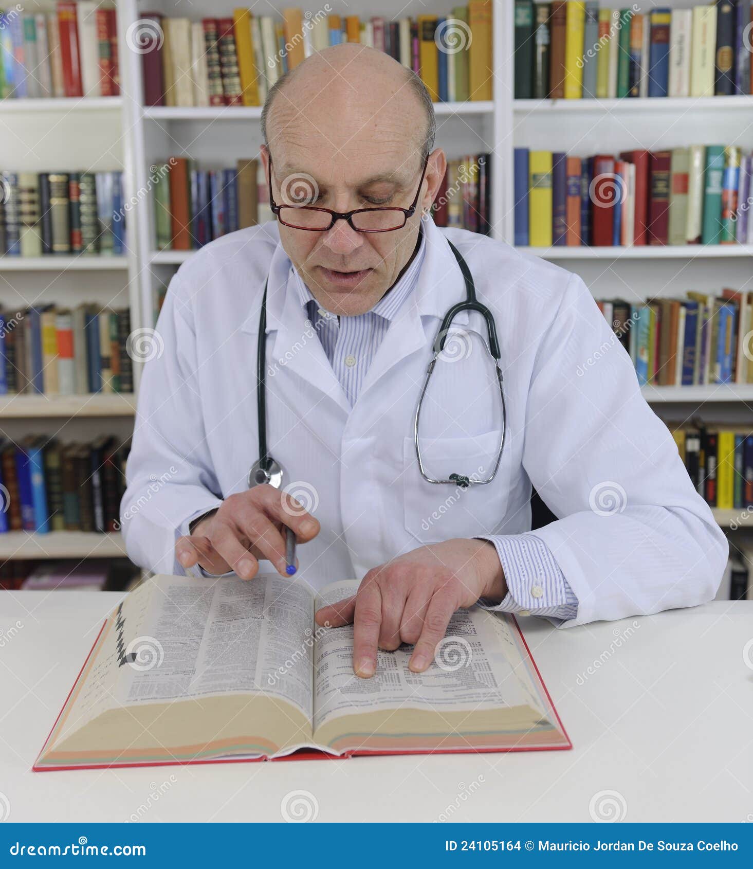 Doctor Looking Up Information on Medicine Stock Photo - Image of ...