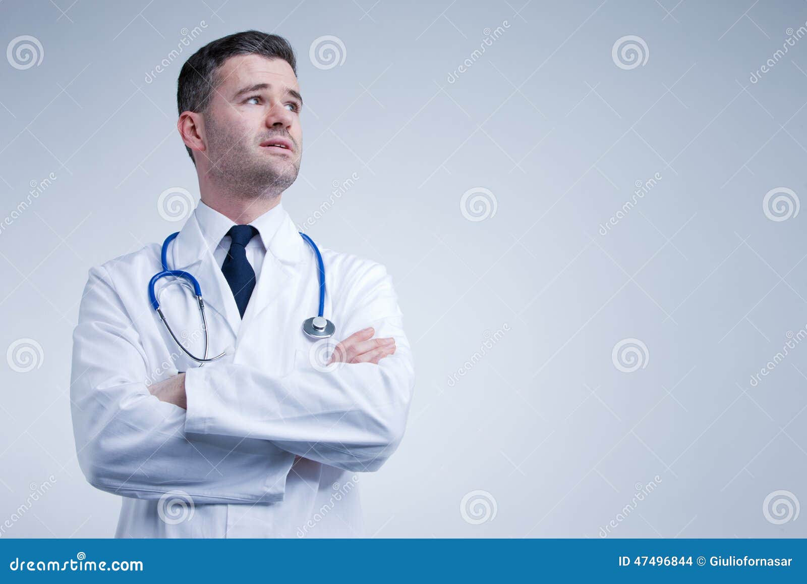 Doctor Looking Up Thinking or Worried Stock Photo - Image of medical ...