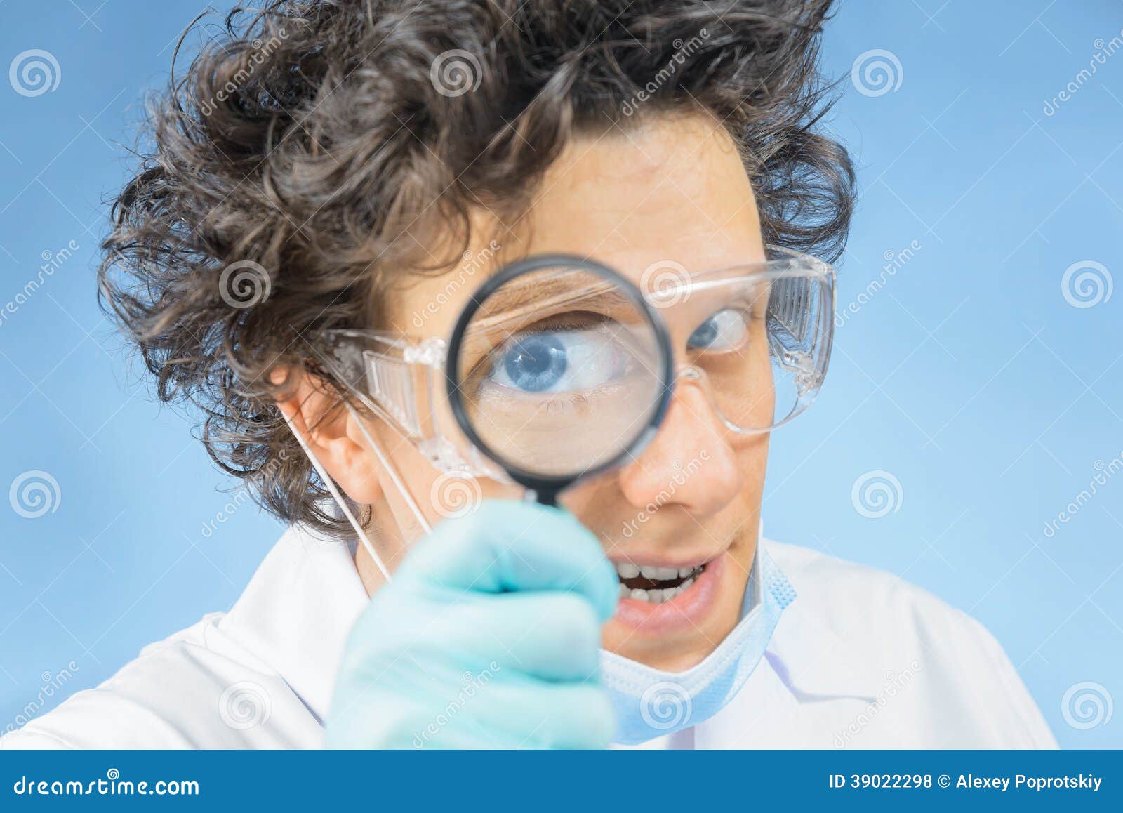 Doctor Looks through a Magnifying Glass Stock Photo - Image of ...