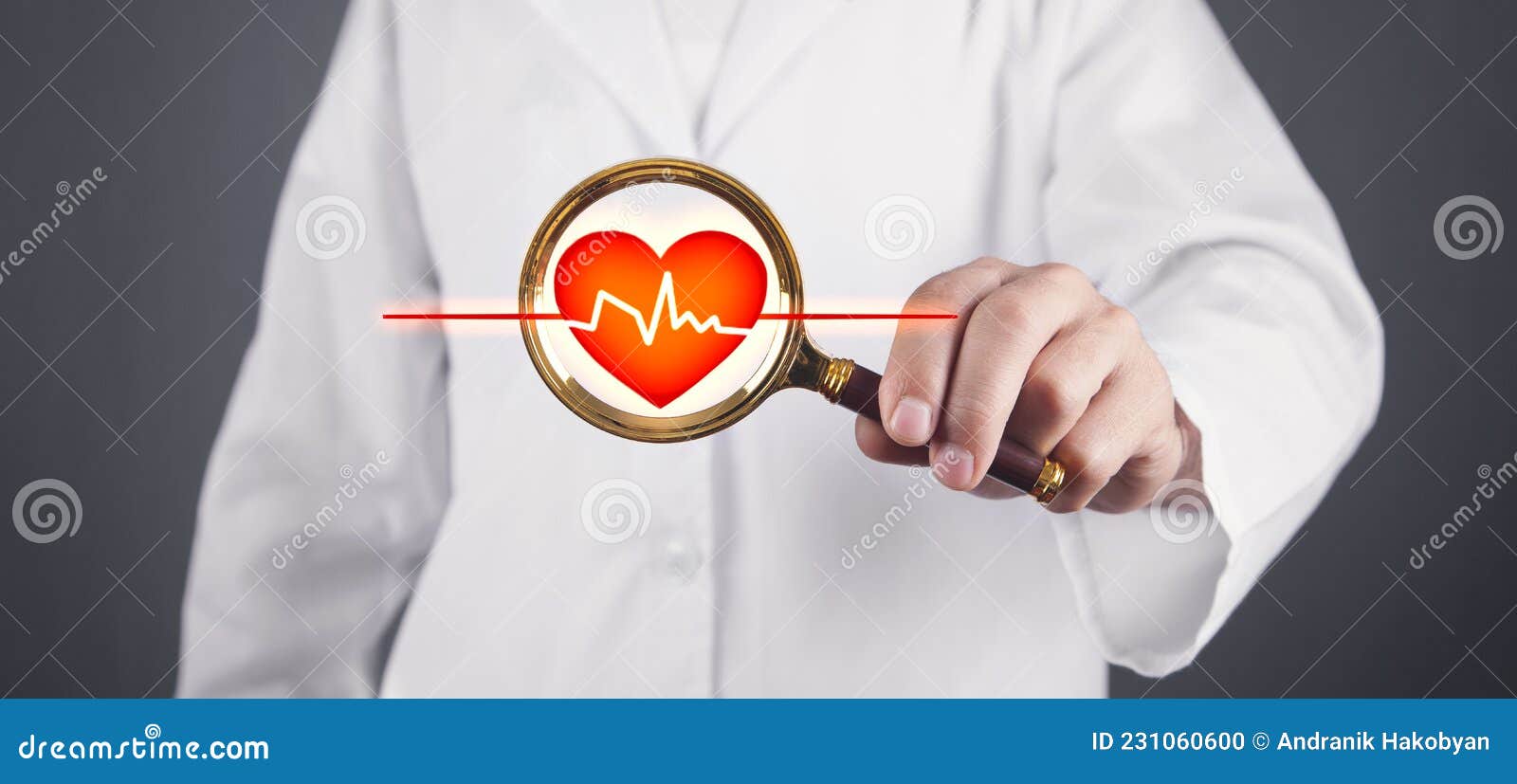 Doctor With A Magnifying Glass Examining Red Heart With Cardiogram
