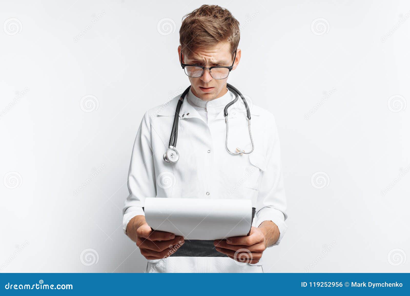 The Doctor Makes Notes in the Documents, a Young Student with a Folder ...