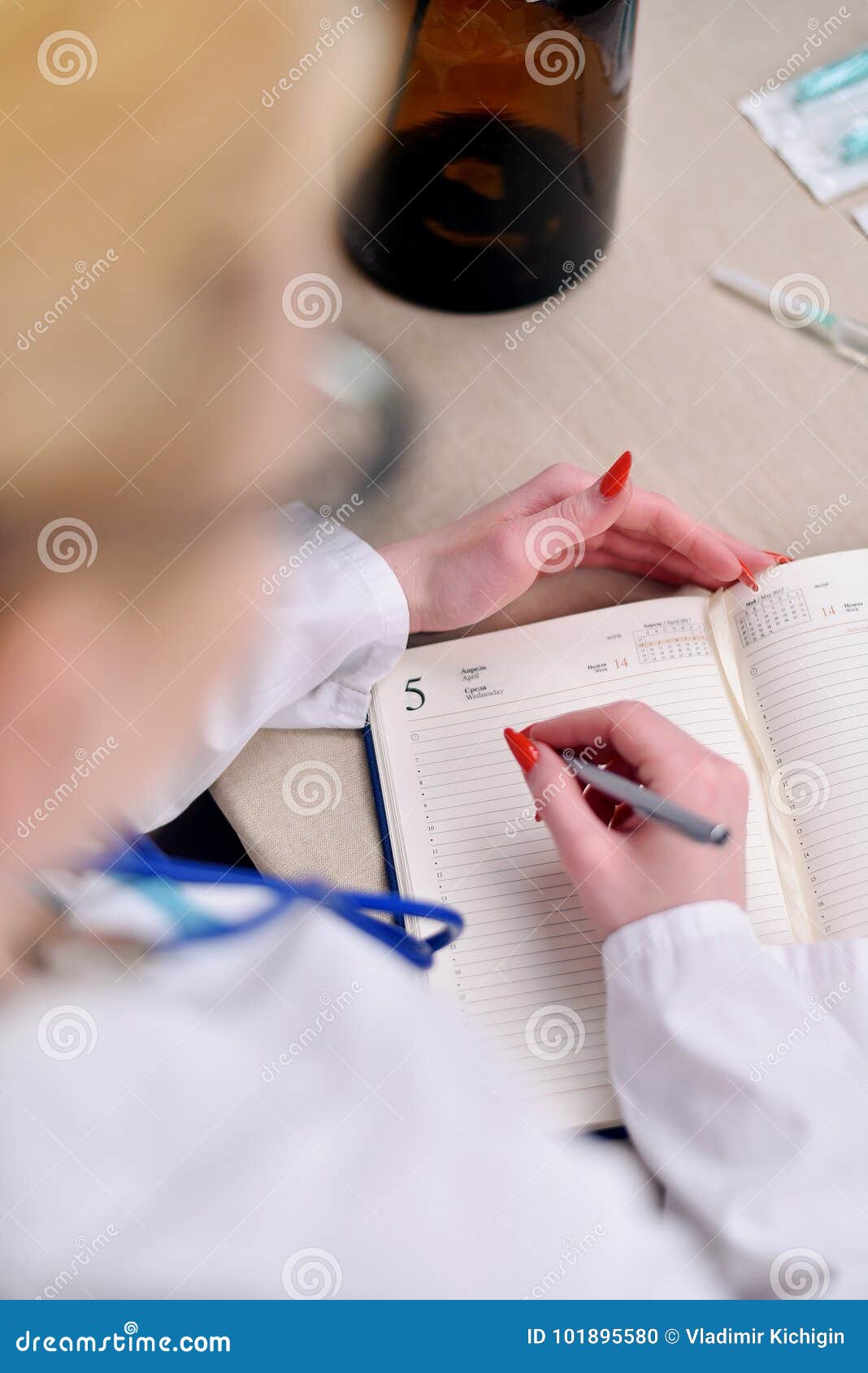 The Doctor Makes Notes in the Diary Stock Photo - Image of listening ...
