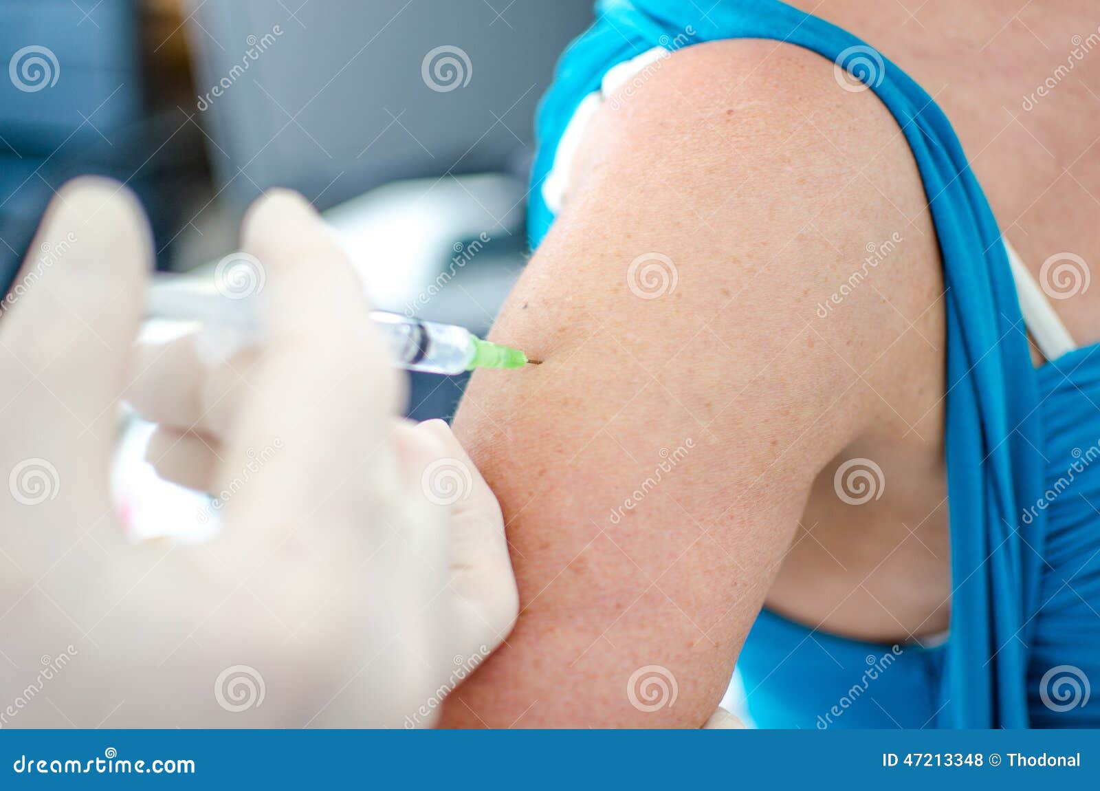 Doctor making an injection stock photo. Image of gloves - 47213348