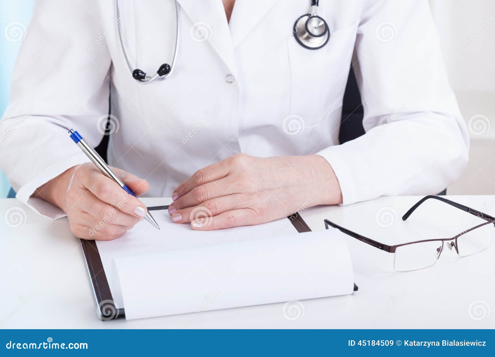Doctor Making Notes in Office Stock Image - Image of recipe, care: 45184509