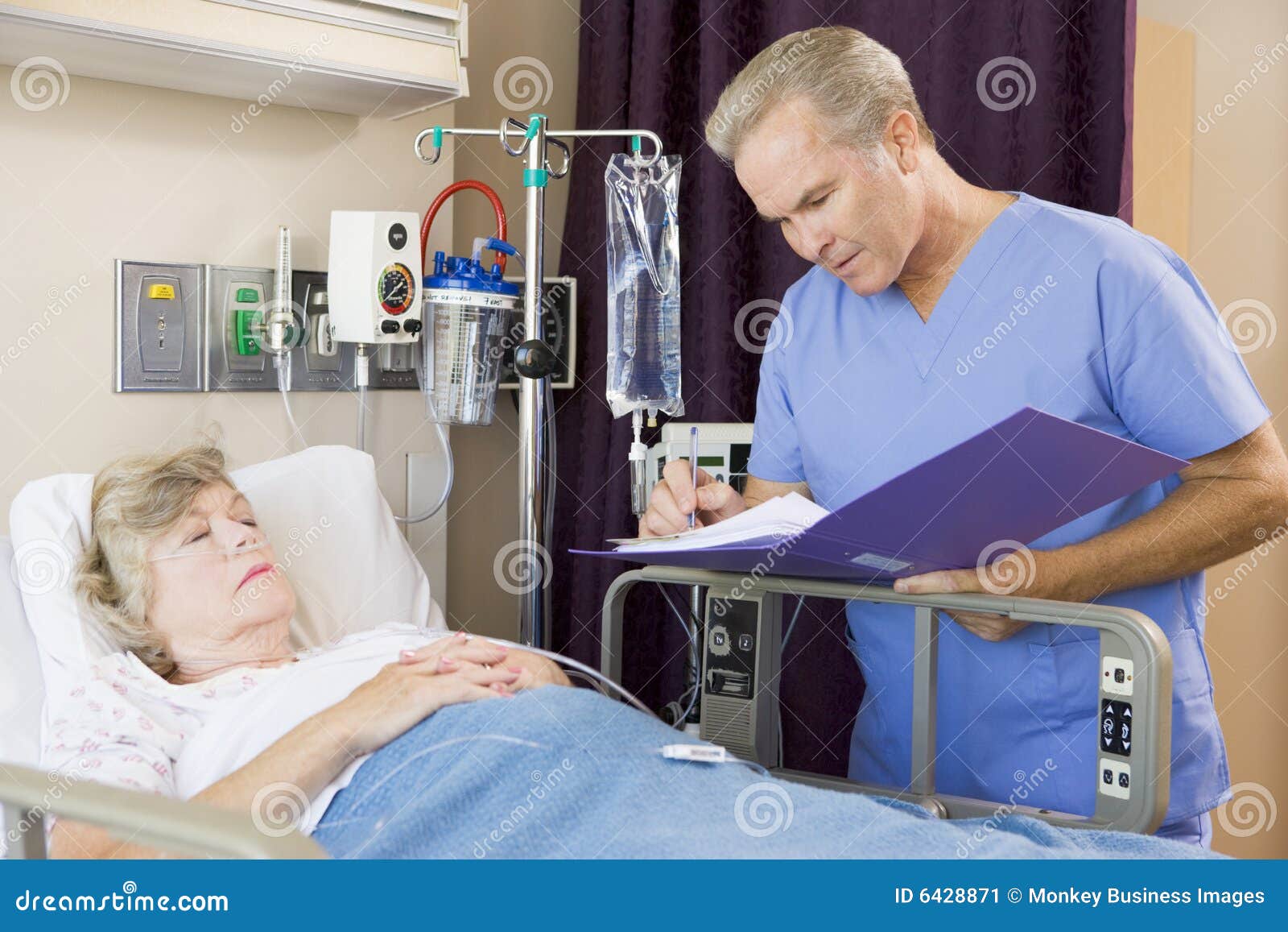 Doctor Making Notes about Patient Stock Image - Image of caring, colour ...
