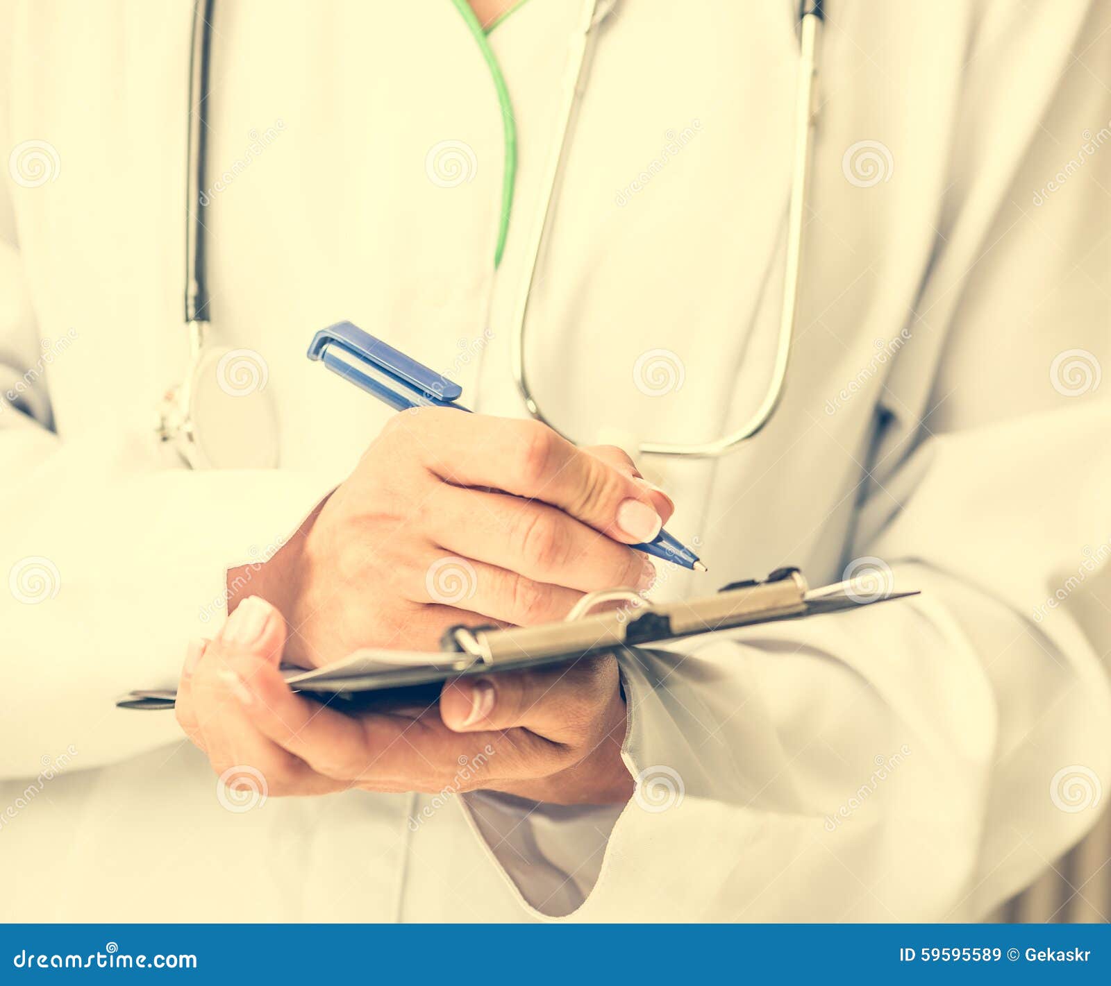 Doctor making notes stock image. Image of professional - 59595589