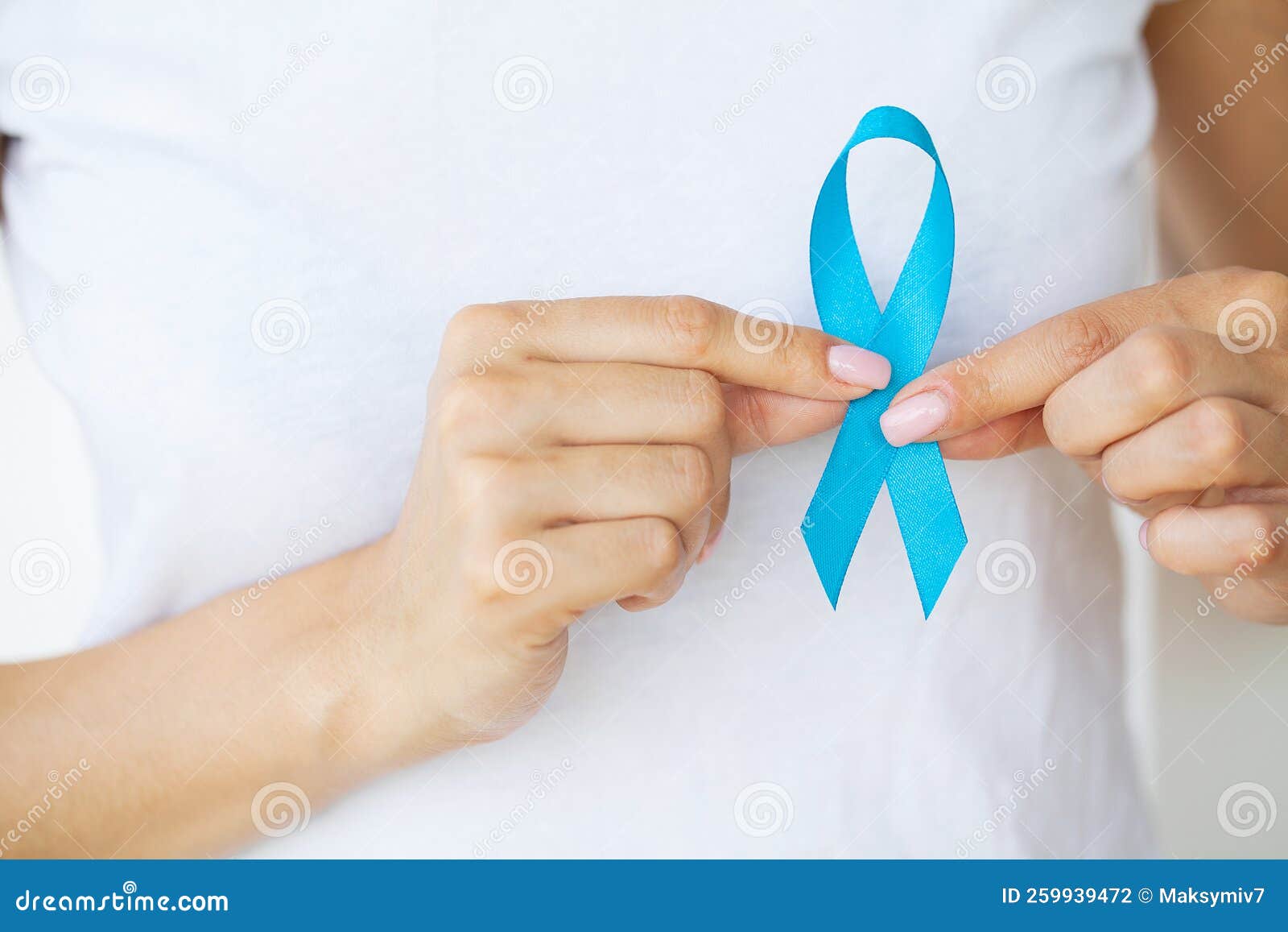 Doctor Man Holding Light Blue Ribbon For Supporting People Living And