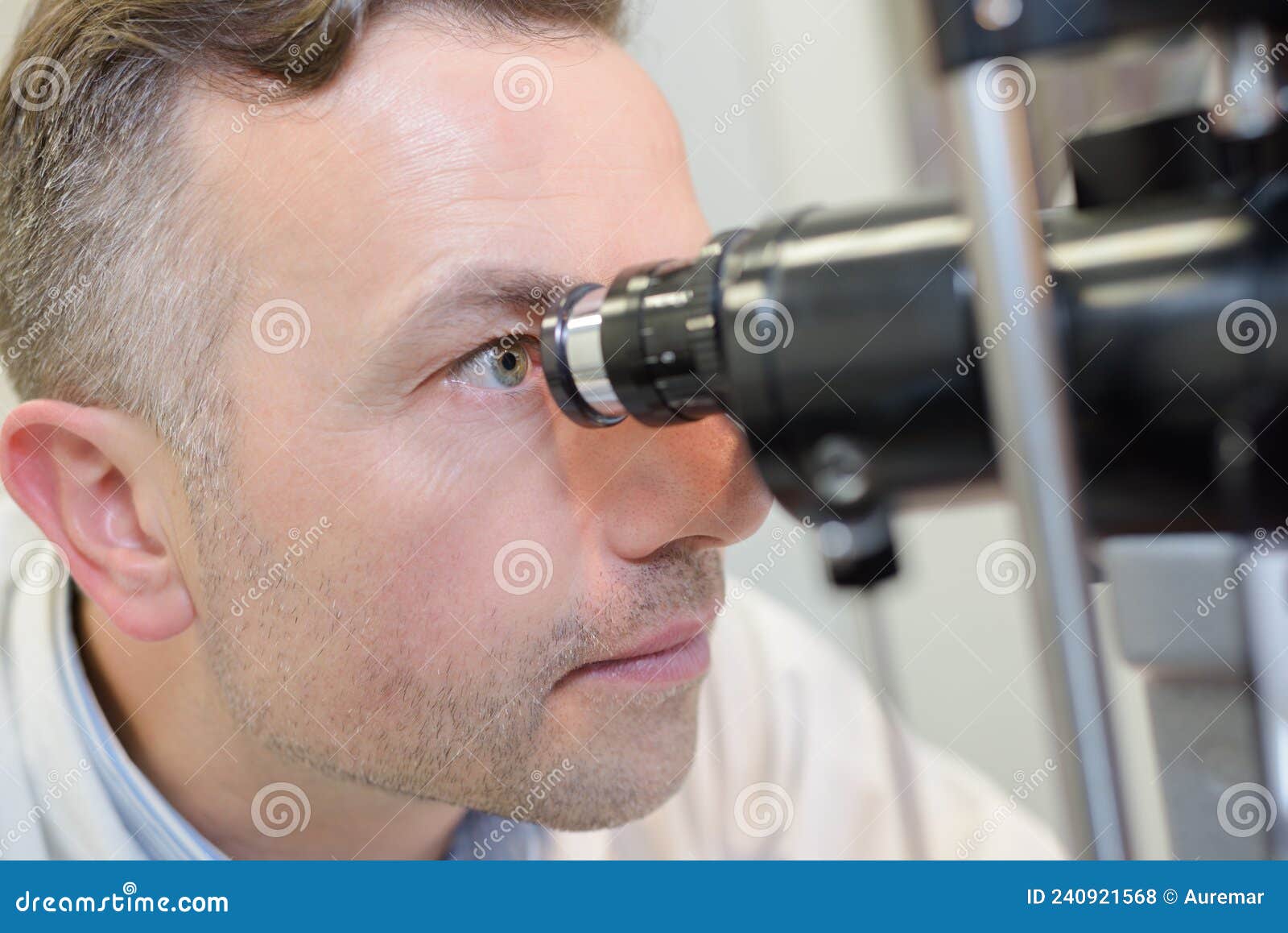 Doctor man with microscope stock photo. Image of professional - 240921568