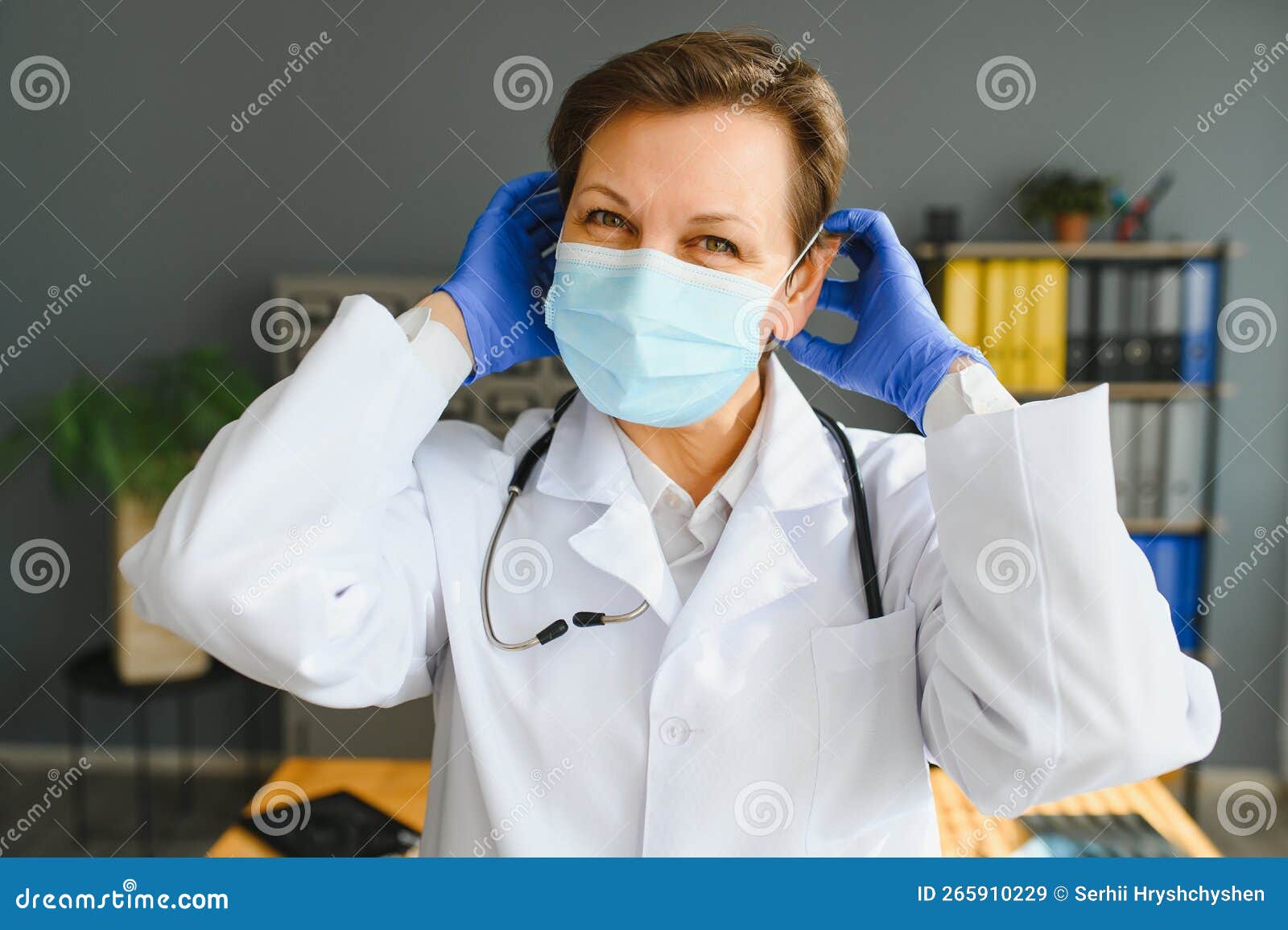 Doctor in Mask with Stethoscope in Hospital. Stock Image - Image of ...