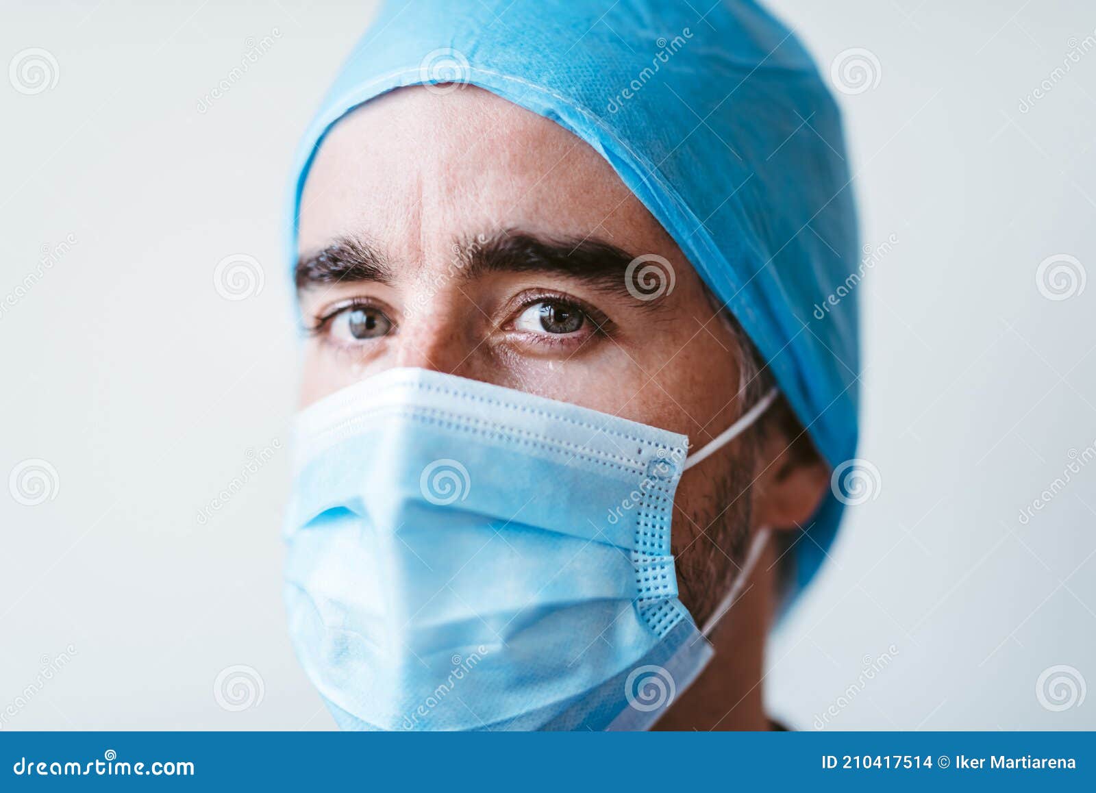Doctor with Mask and Uniform Facing the Camera Stock Photo - Image of ...