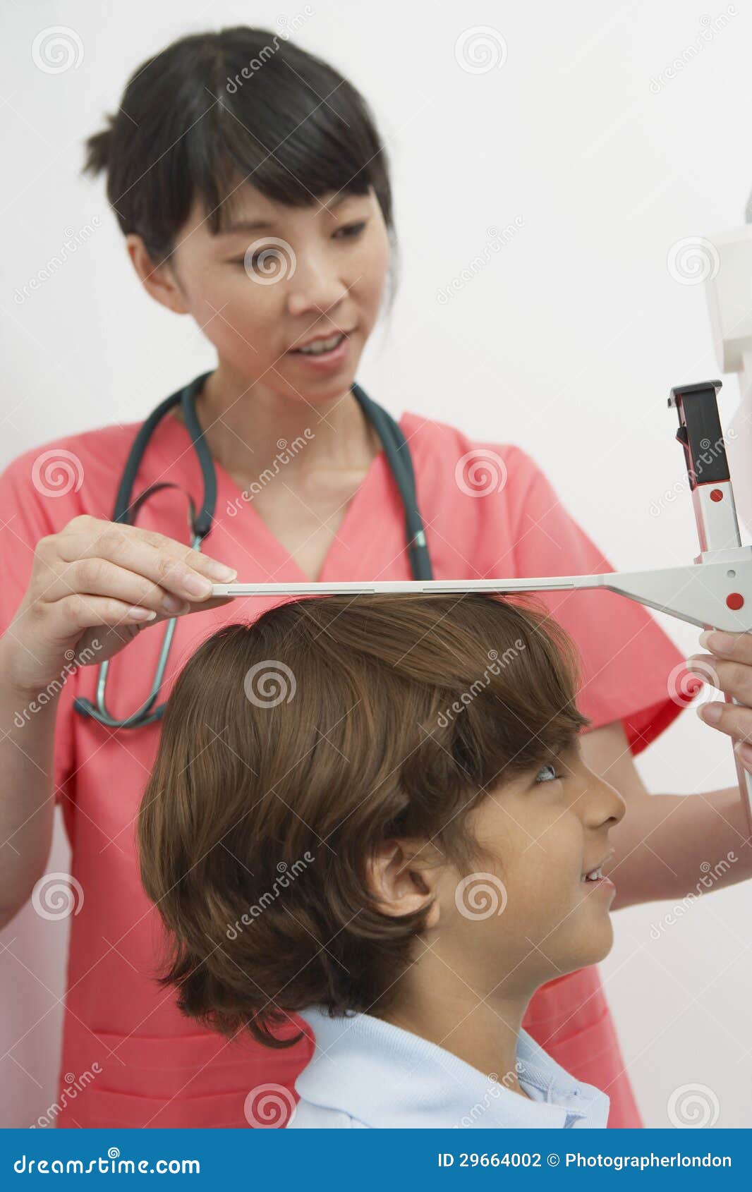 Boy Measuring Height In Classroom Stock Image | CartoonDealer.com #29662615