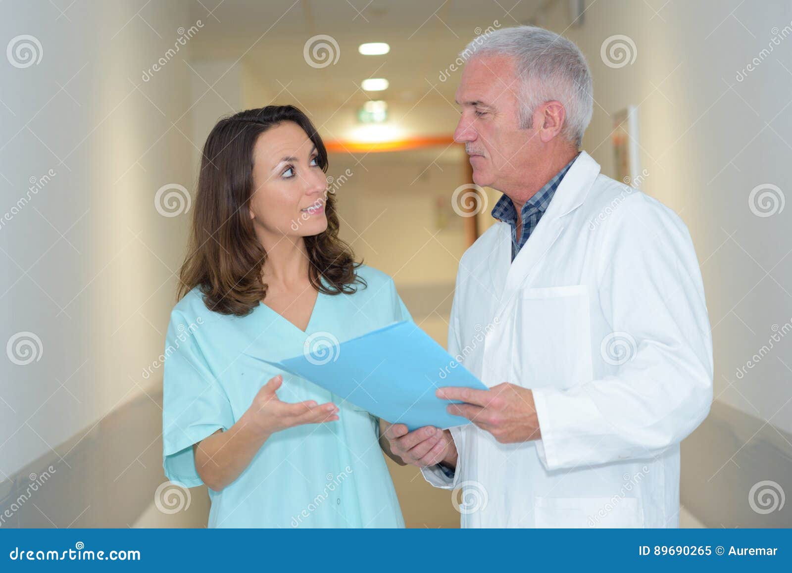 Doctor and Medical Assistant Having Conversation Stock Image - Image of ...