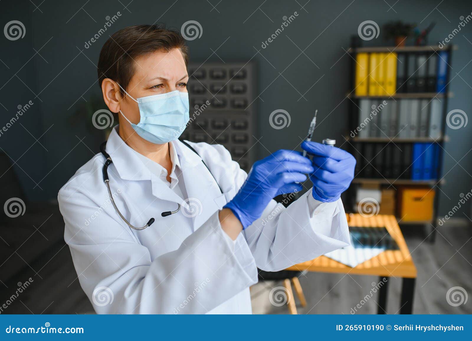 Doctor with Medical Syringe in Hands, Getting Ready for Injection Stock ...