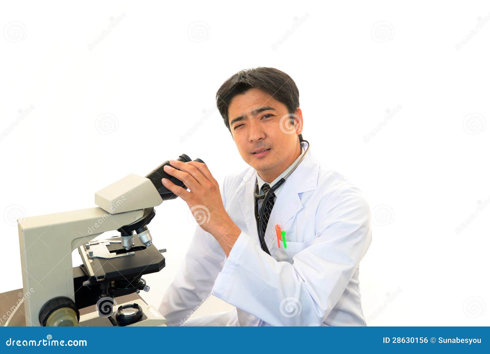 Doctor with a Microscopic Examination Stock Photo - Image of handsome ...
