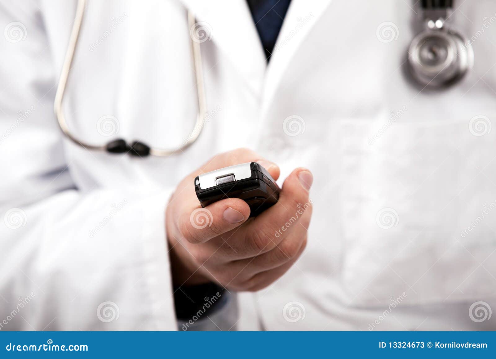 Doctor with mobile phone stock image. Image of seriously - 13324673