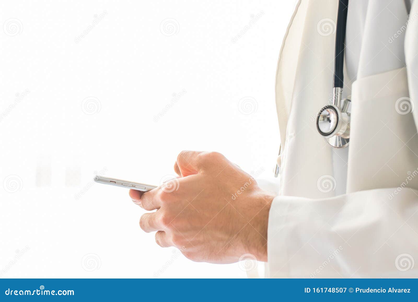Doctor with mobile phone stock image. Image of cellphone - 161748507