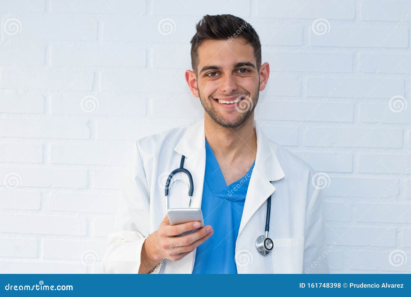 Doctor with mobile phone stock photo. Image of asian - 161748398