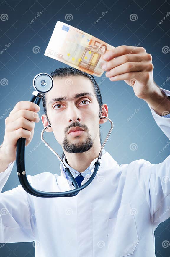 Doctor with money stock photo. Image of dollar, fees - 22663520