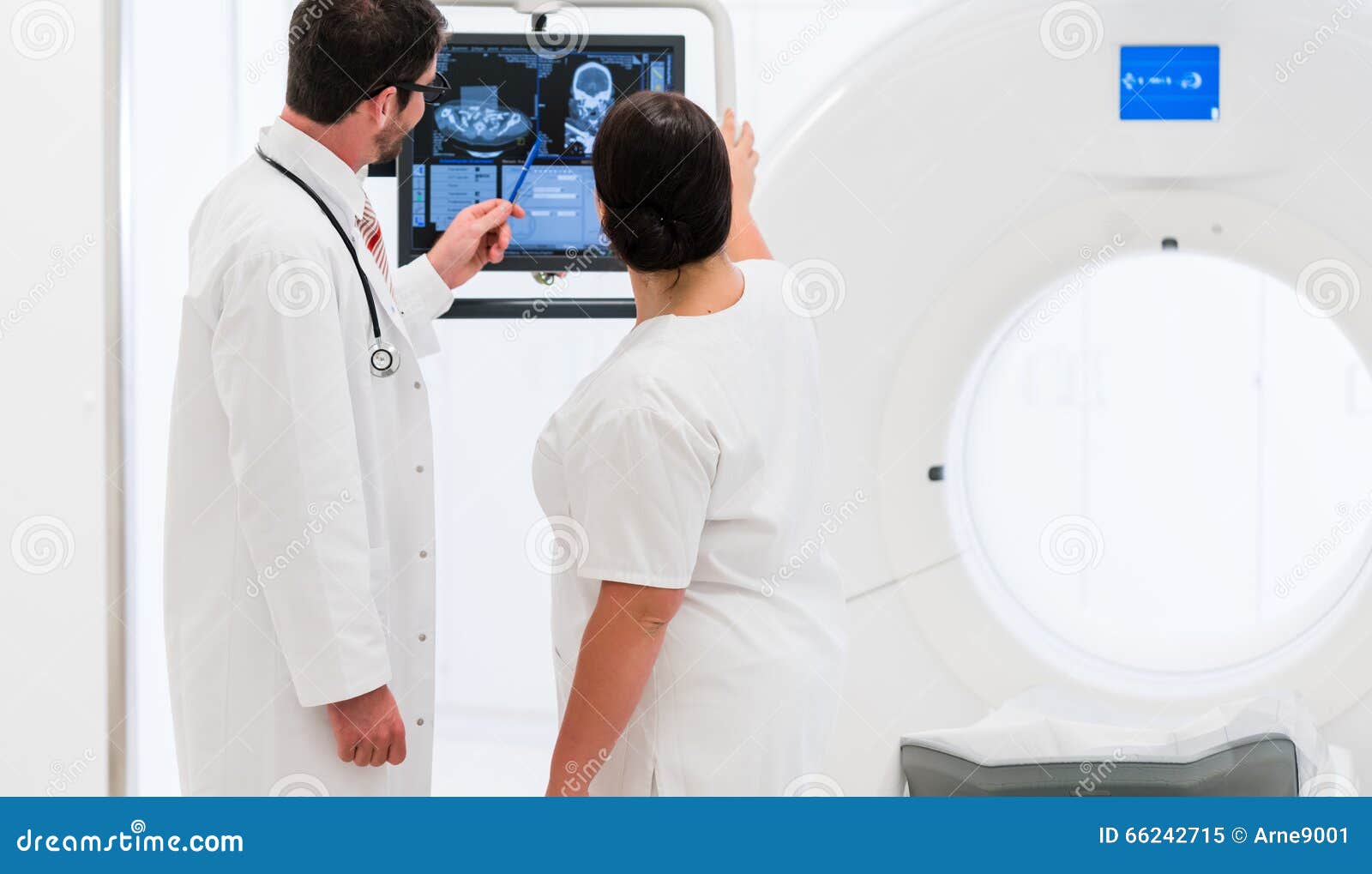 Doctor and Nurse Analyzing Data of CT Scan Stock Image - Image of ...