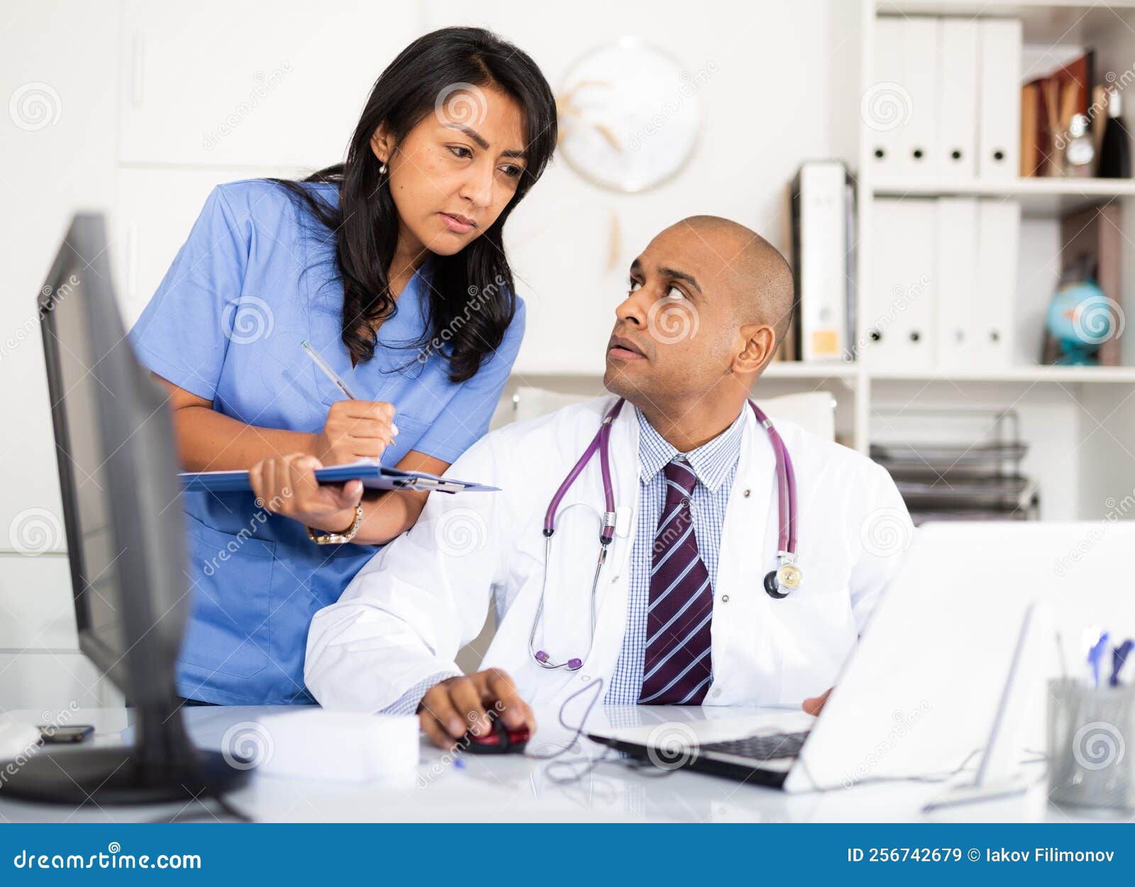 Doctor and Nurse Check Patient Data in Hospital Computer Stock Image ... Doctor and Nurse Check Patient Data in Hospital Computer Stock Image ...