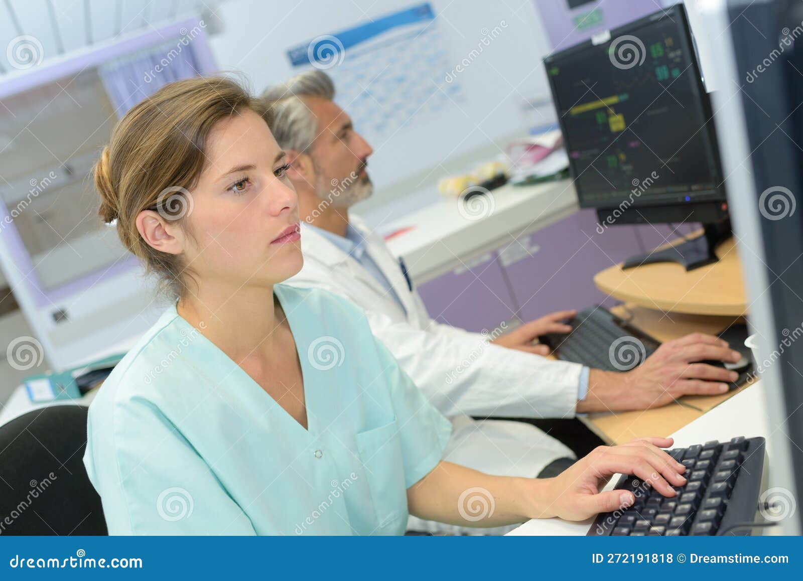 Doctor and Nurse Checking Computers Stock Photo - Image of holding ...