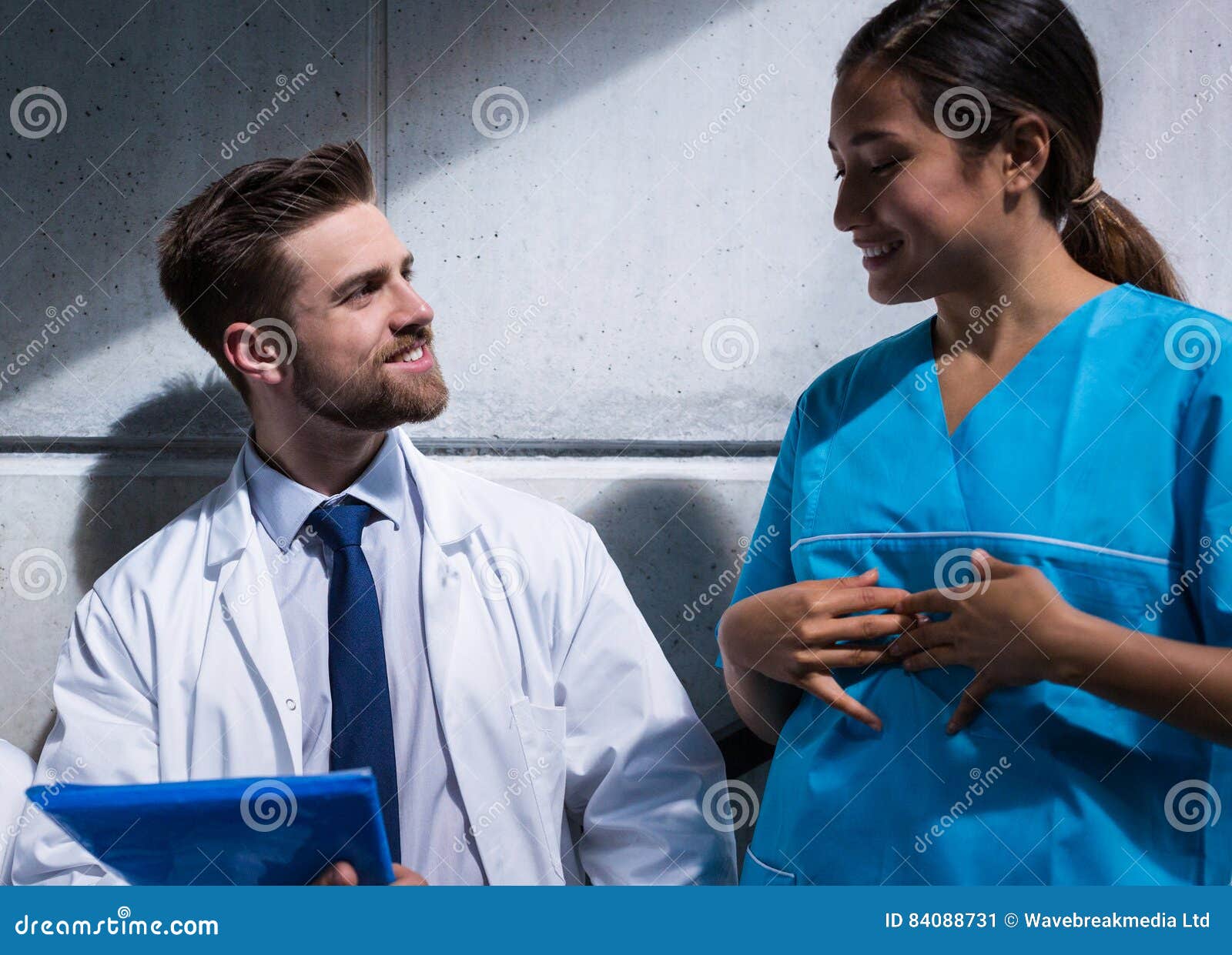 Doctor and Nurse Having a Conversation Stock Image - Image of male ...