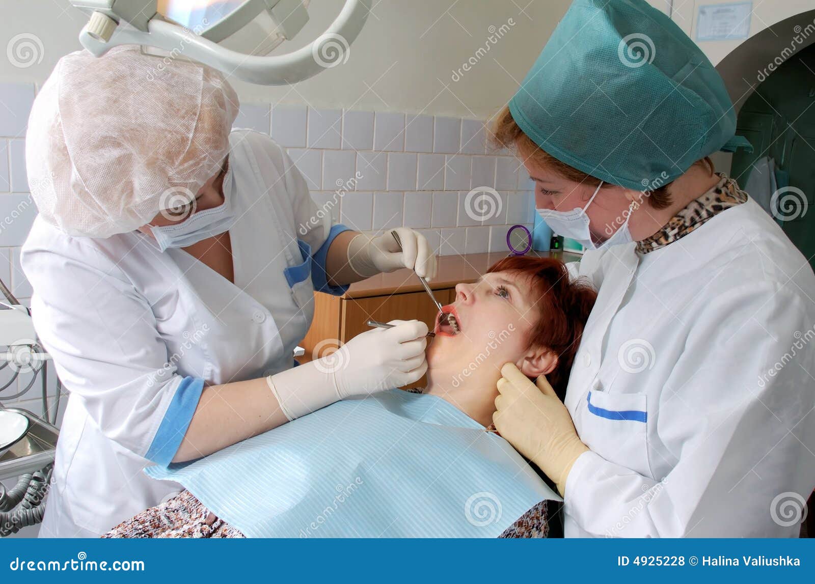 Doctor And Nurse Make Medical Inspection Picture. Image: 4925228