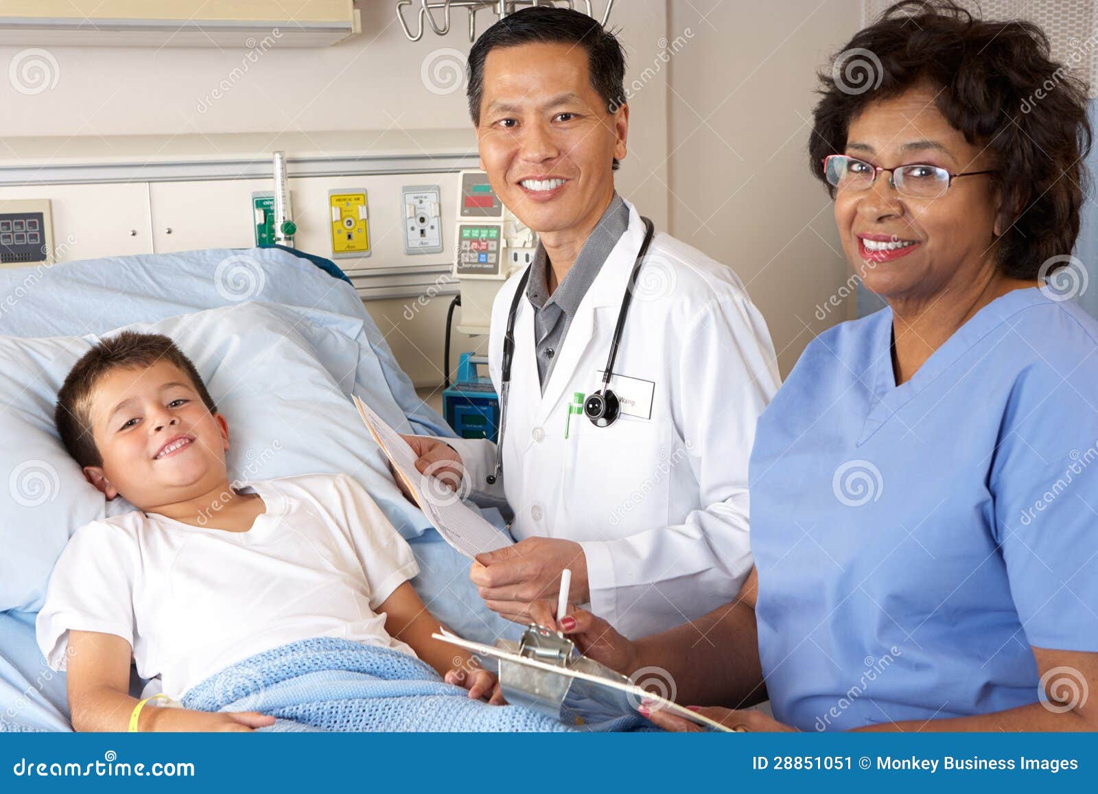 Doctor and Nurse Visiting Child Patient on Ward Stock Image - Image of ...